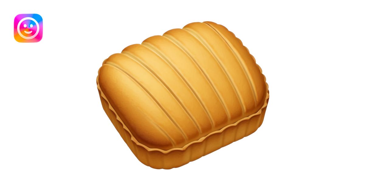 A madeleine pastry. Oval shaped with four to five vertical lines going ...