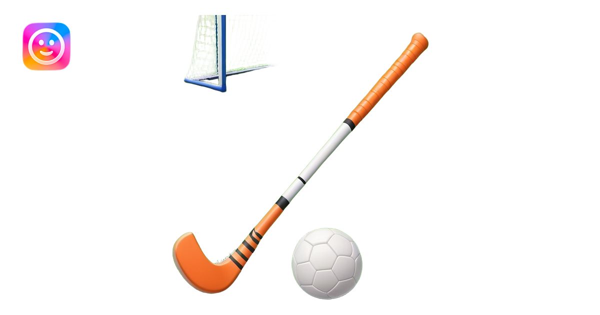 A field hockey stick and ball on a vibrant green grass field, with ...